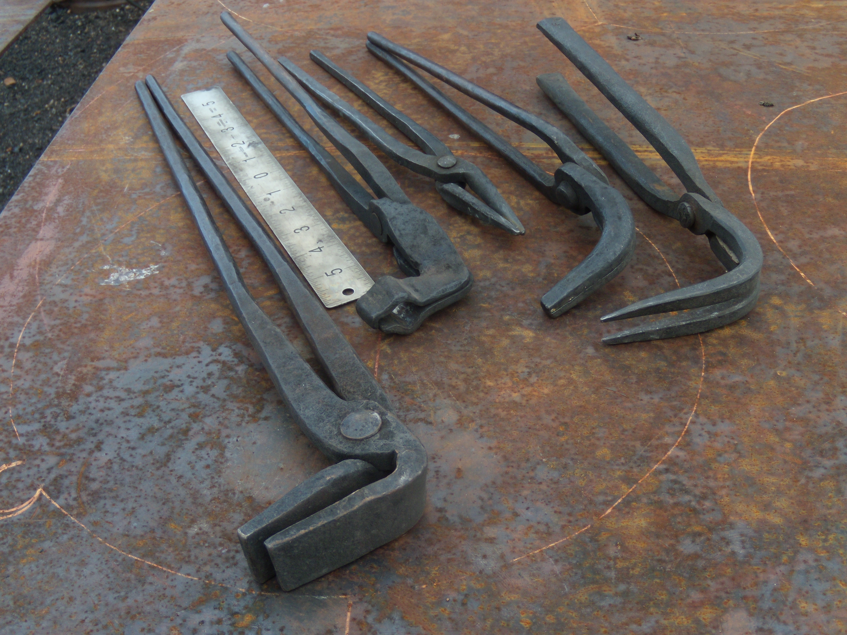 Scrolling tongs: straight or bent nose? - Tongs - I Forge Iron